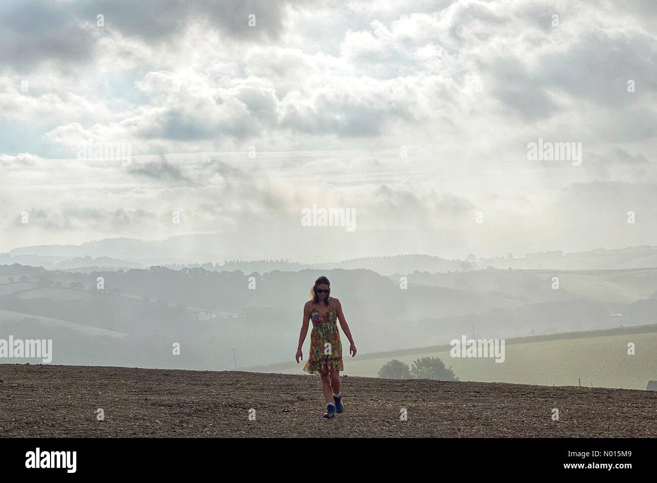 Teign Valley, Devon, UK. 26th Sept 2021. UK Weather: Mists lift over ...