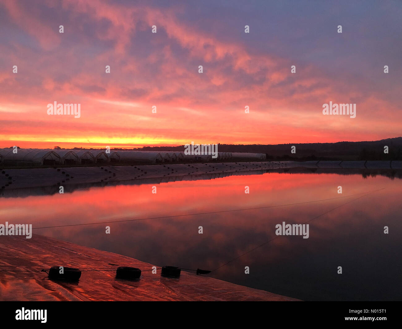 UK Weather: Sunrise over Godalming. Tuesley Farm, Godalming. 18th ...