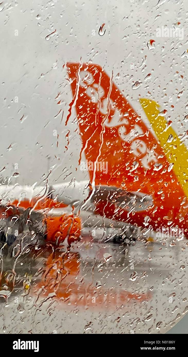 EasyJet seen through Rain covered airplane window, Gatwick Airport, UK ...