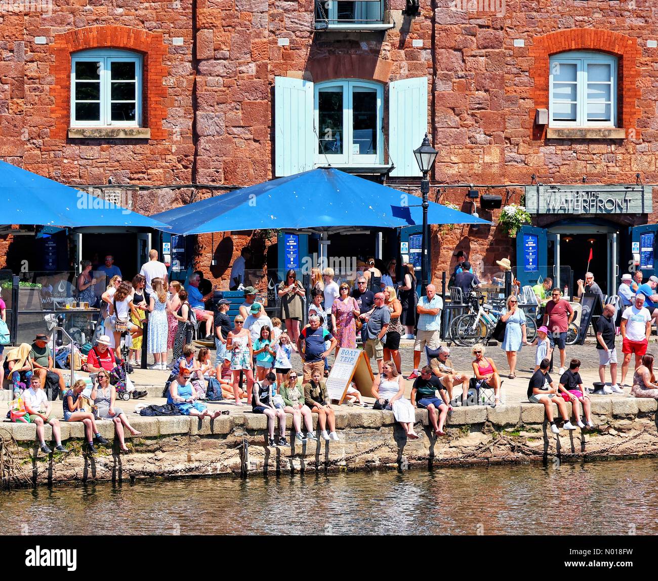 UK Weather: Crowds enjoy dragon boat festival in sunshine at Exeter ...