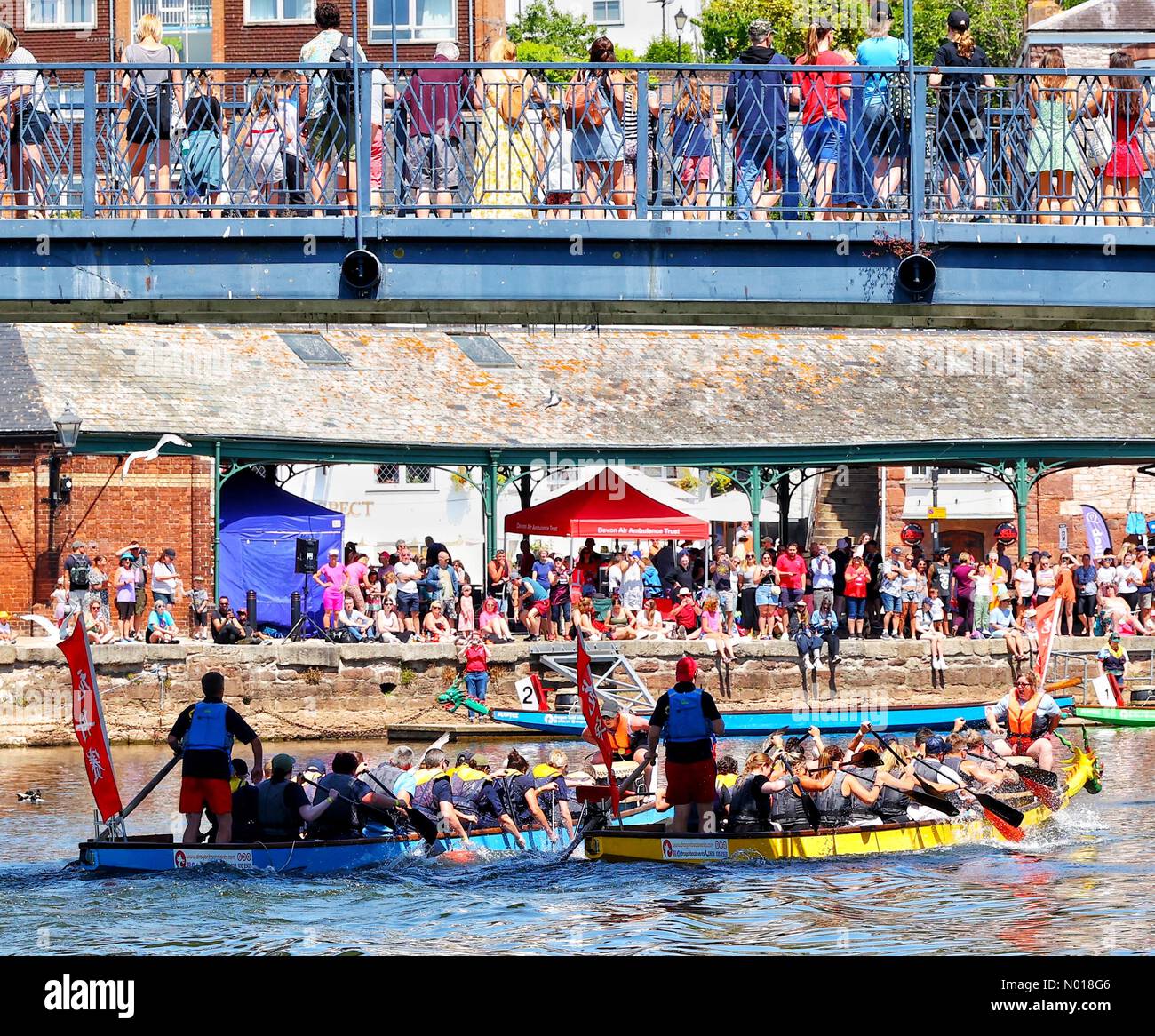 UK Weather: Crowds enjoy dragon boat festival in sunshine at Exeter ...