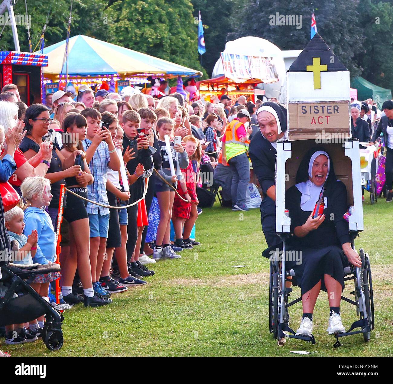 Crowds enjoy Dawlish Carnival 50th annual fancy dress pram race ...