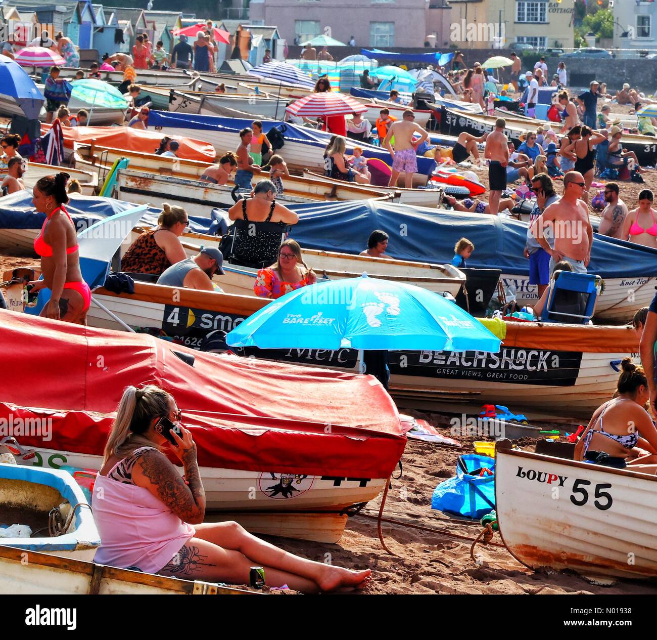 UK Weather: Packed beach crowds during Teignmouth Sea Shanty festival ...