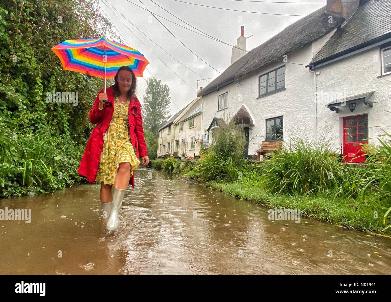 Exeter, Devon, UK. 17th Sep 2023. UK Weather: Brollies out! Raich Keene ...