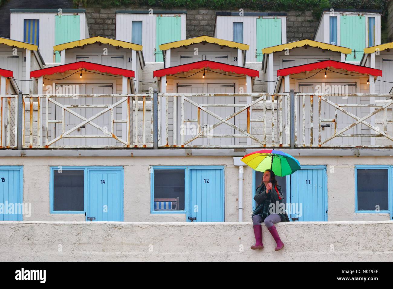 UK Weather: Colourful huts at Tolcarne beach on an overcast and rainy ...