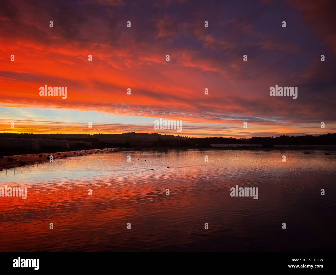 UK Weather: Sunrise over Godalming. Tuesley Farm, Godalming. 22nd ...
