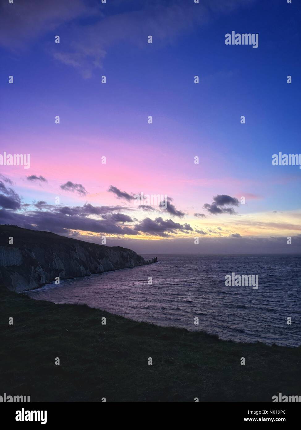 UK Weather: Sunset on the Isle of Wight. The Needles, Isle of Wight ...