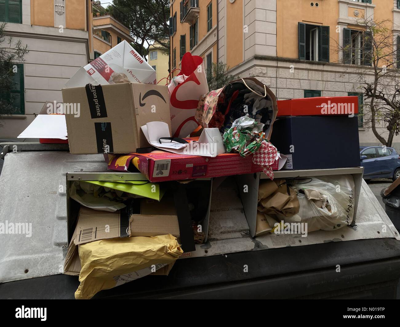Christmas rubbish left by recycling bins in Rome, Italy Credit: amer ...