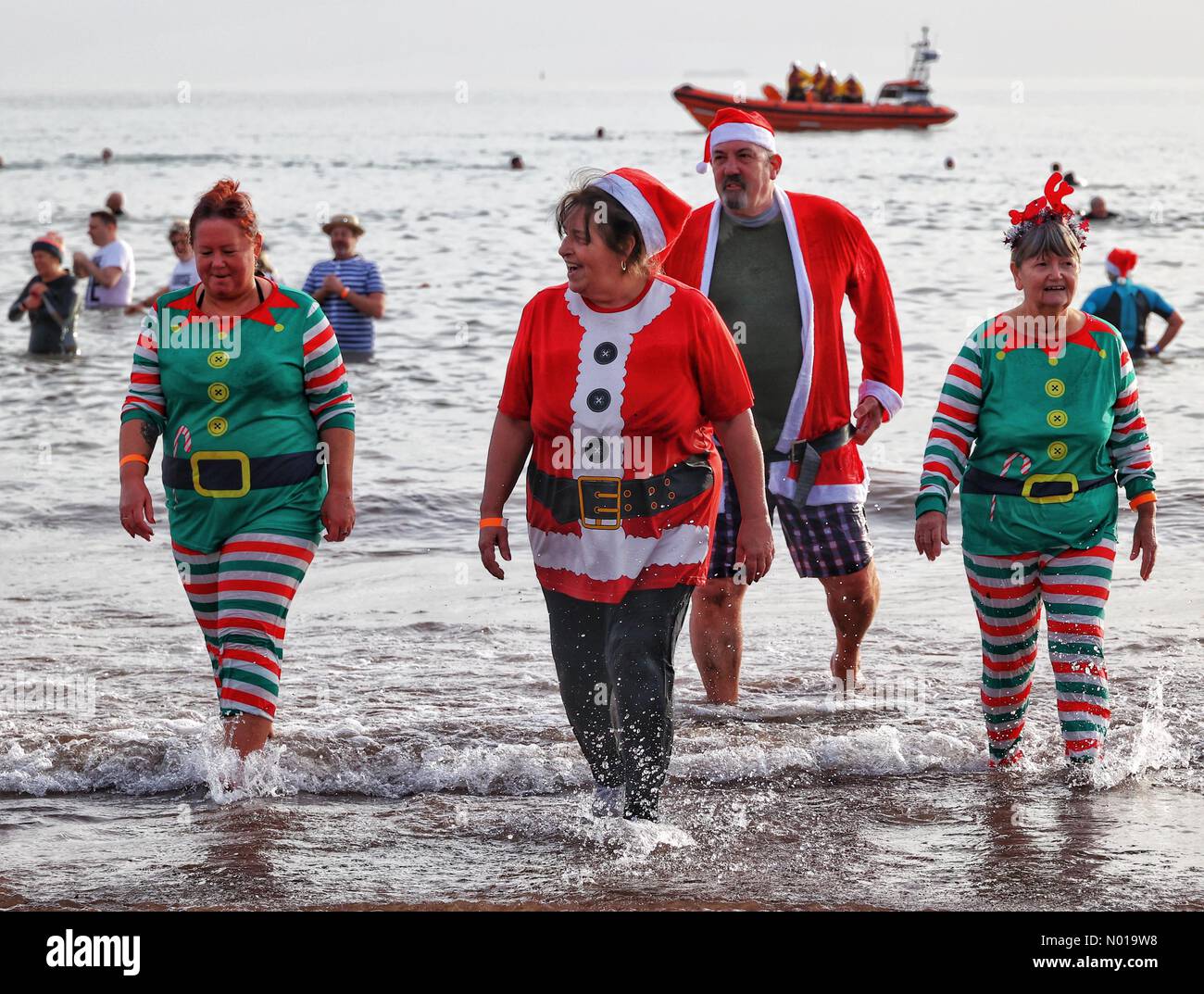 Colourful crowds flood Teignmouth beach for the popular annual Boxing ...