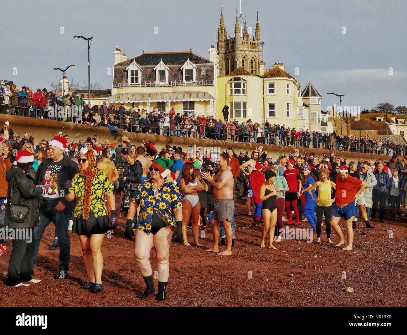 Colourful crowds and swimmers enjoy Boxing Day dip at Teignmouth, Devon ...