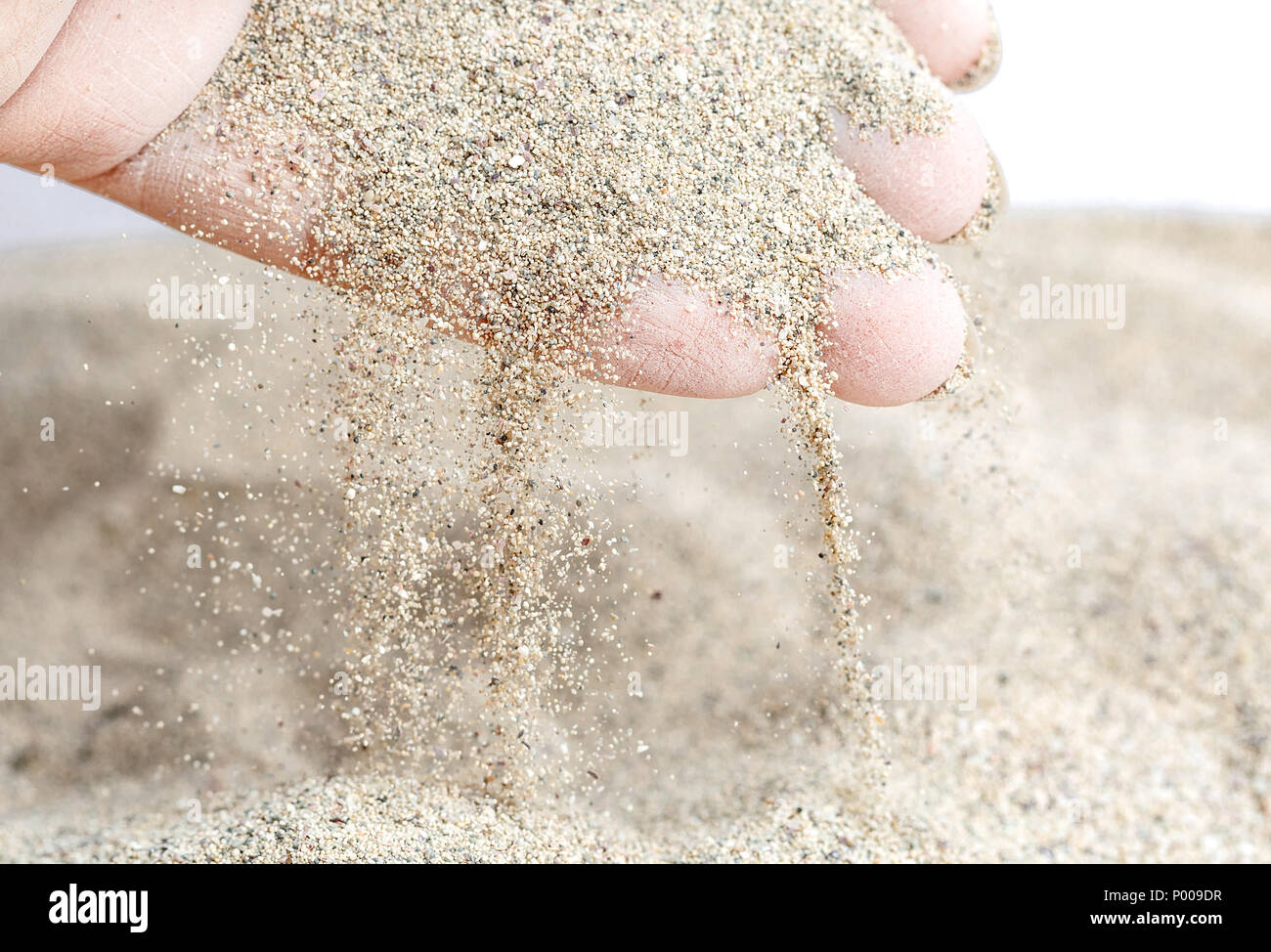 Sand flowing through hands hi-res stock photography and images - Alamy