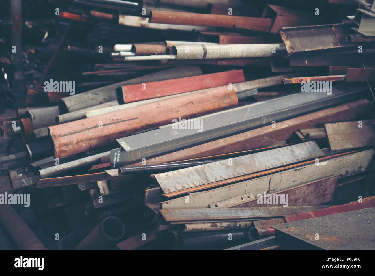 Stack of steel pipes in metal factory shop Stock Photo - Alamy