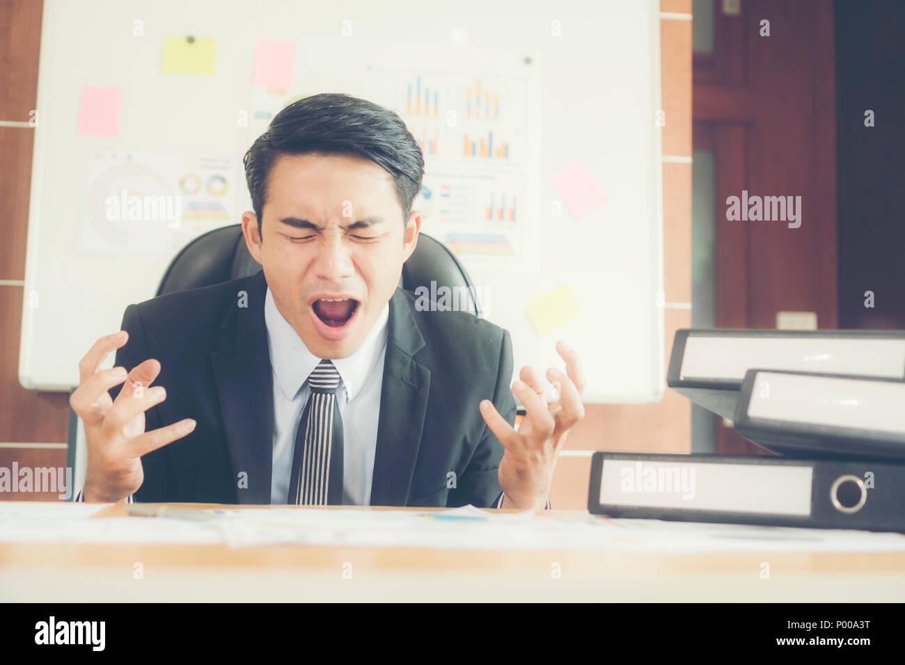 stressed business man in the office Stock Photo - Alamy
