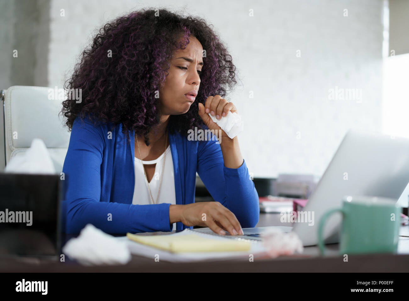 Sick african american girl working from home office. Ill young black ...