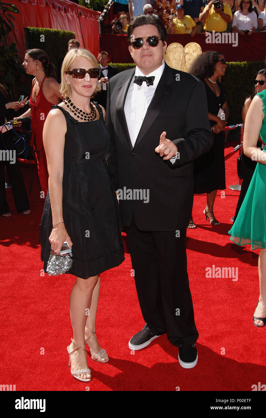 Oliver Pratt and wife arriving at the at the 58th Emmys Awards at The ...