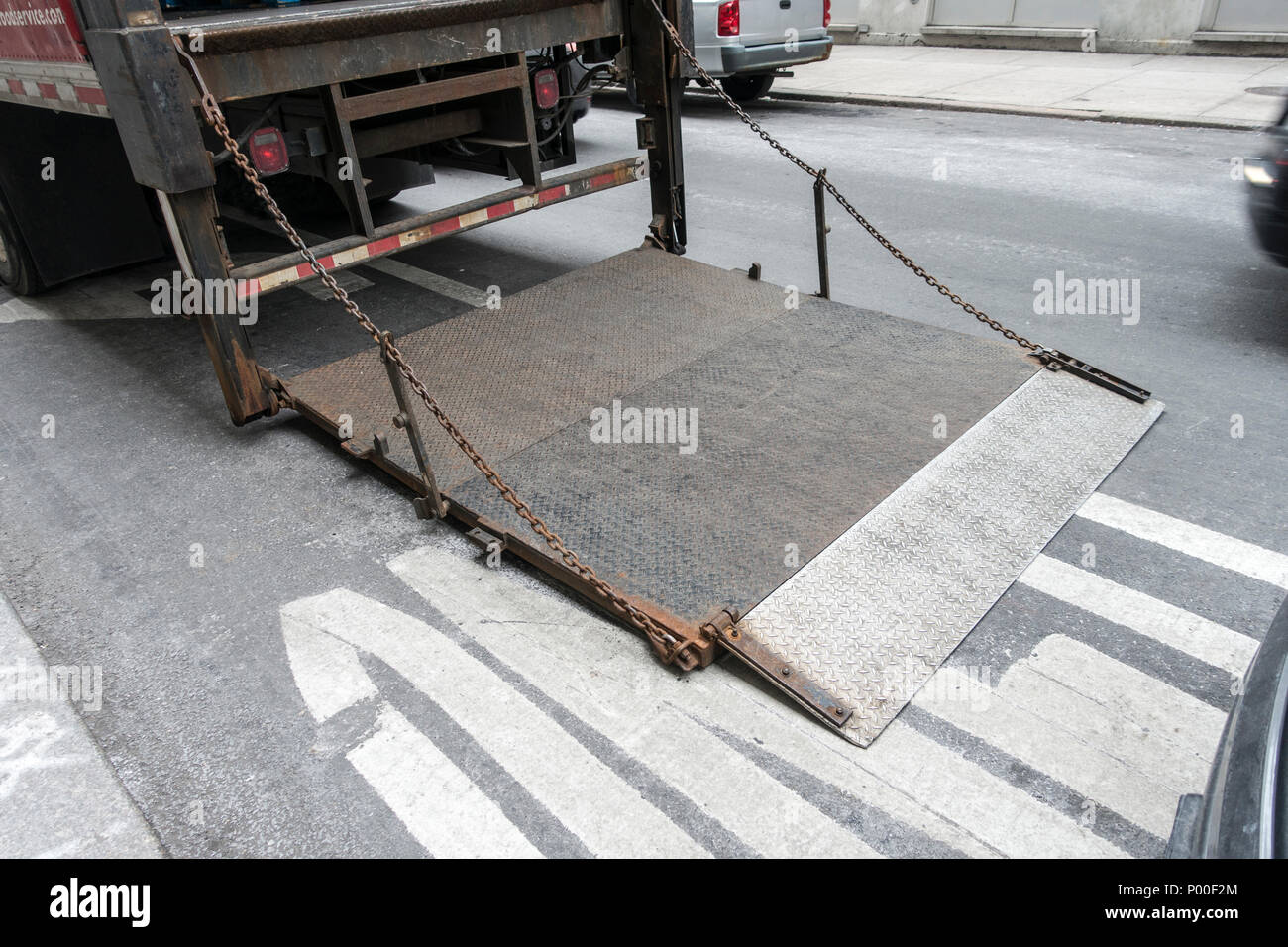 back of shipping truck ground floor diamond steel power lift Stock ...