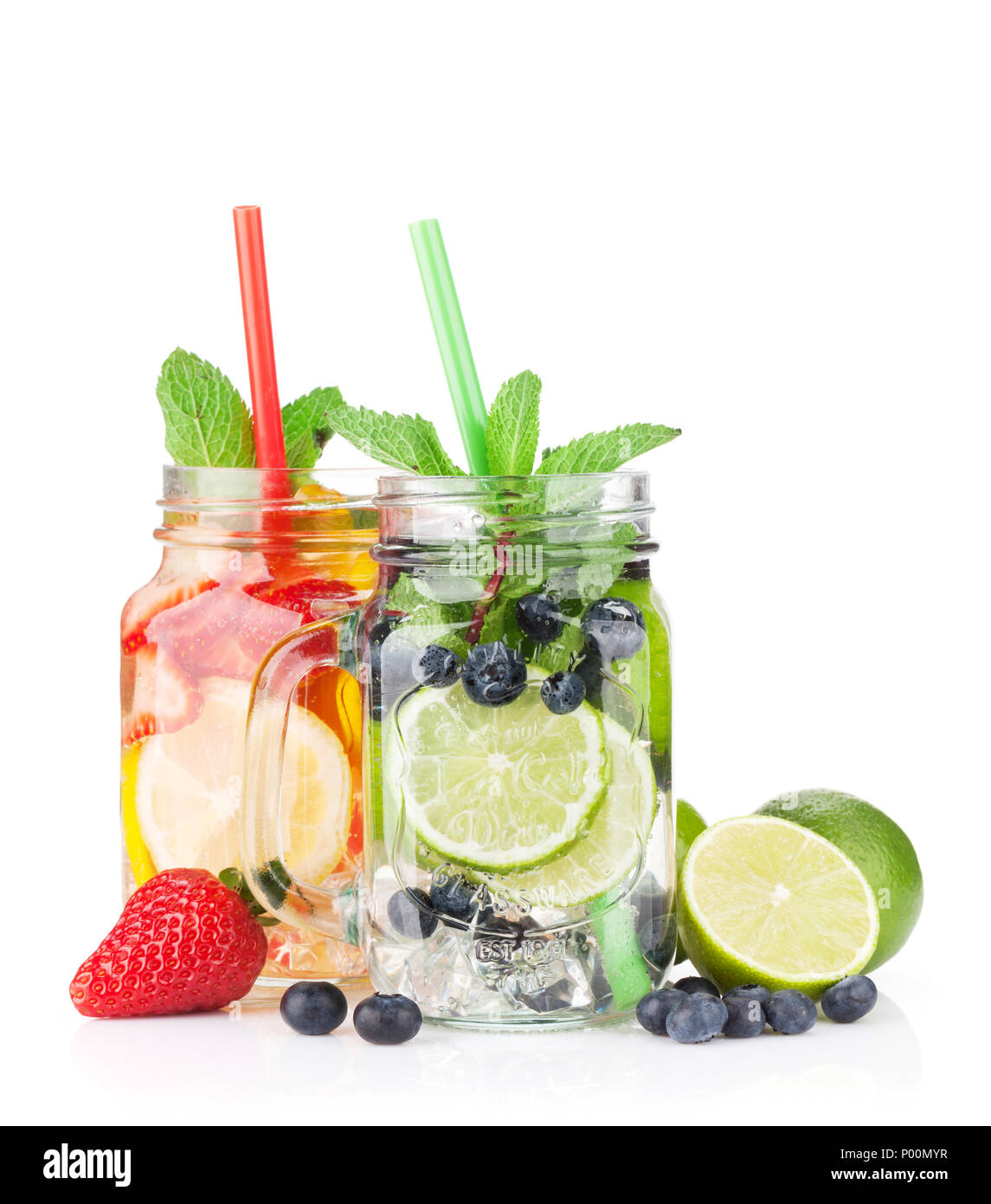 Fresh lemonade jar with summer fruits and berries. Isolated on white ...