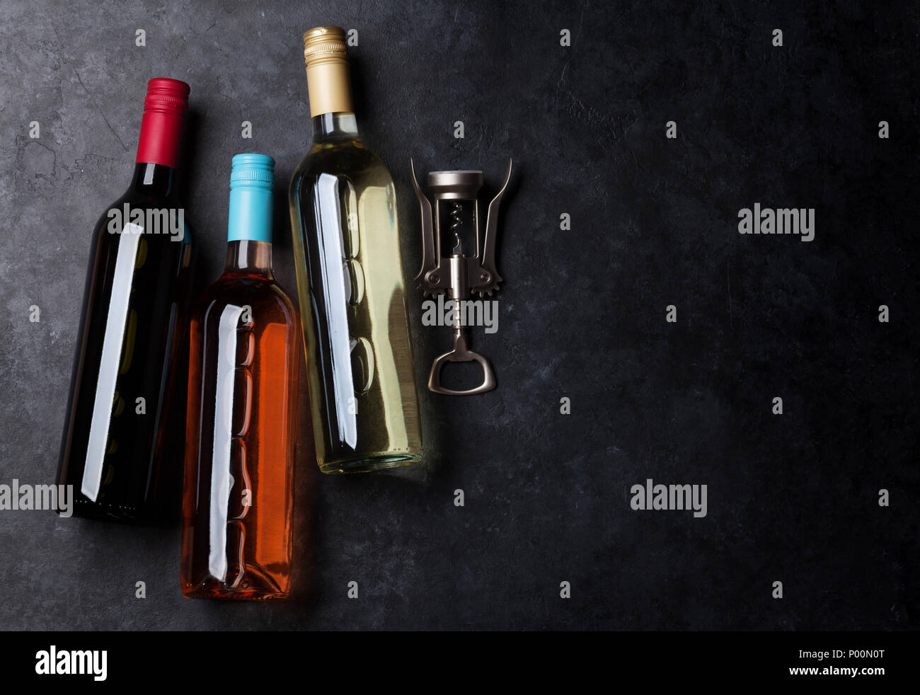 Red, rose and white wine bottles. Top view with space for your text ...