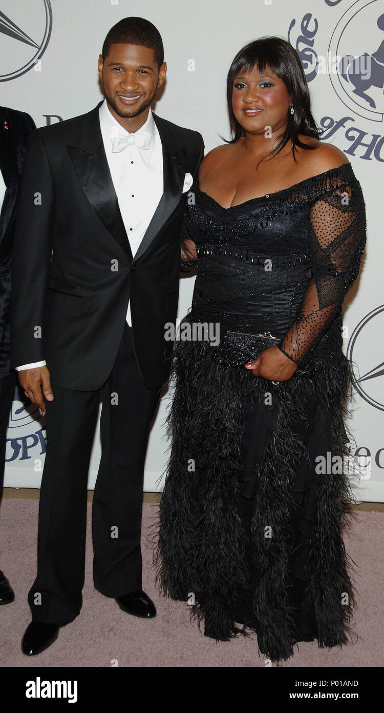Usher and mom arriving at 17th Carousel Of Hope at the Beverly Hilton ...