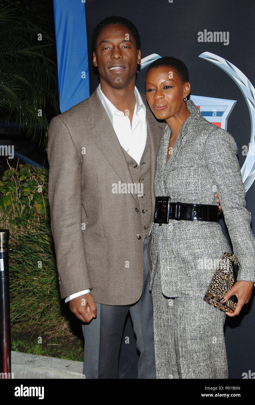Isaiah Washington and wife arriving at the DREAM GIRLS Premiere at the ...