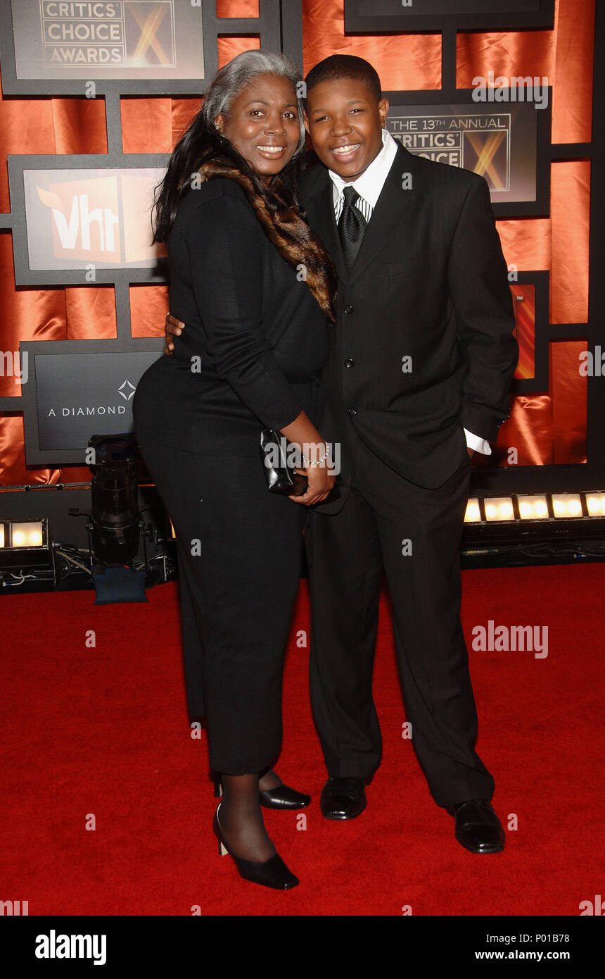 Denzel Whitaker with his mom arriving at the 13th Annual Critic's ...