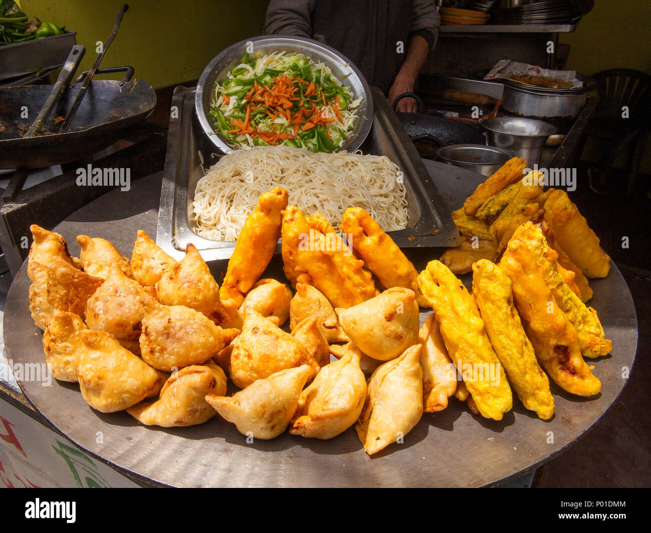 Indian snacks on display at a popular restaurant, Nainital, Uttarakhand ...