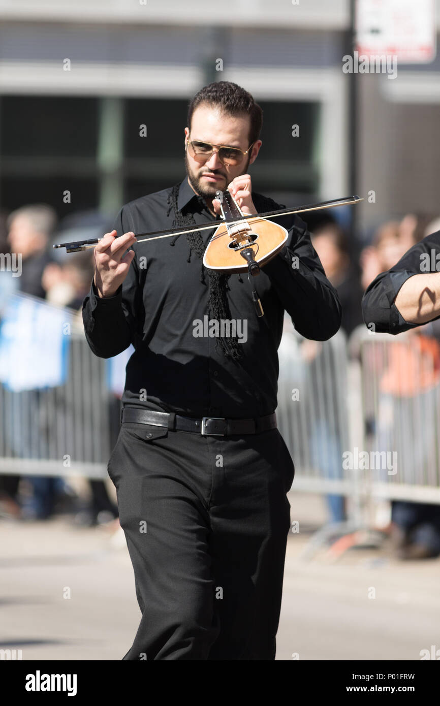 Chicago, Illinois, USA - April 29, 2018 Greek man playing the Lyra ...