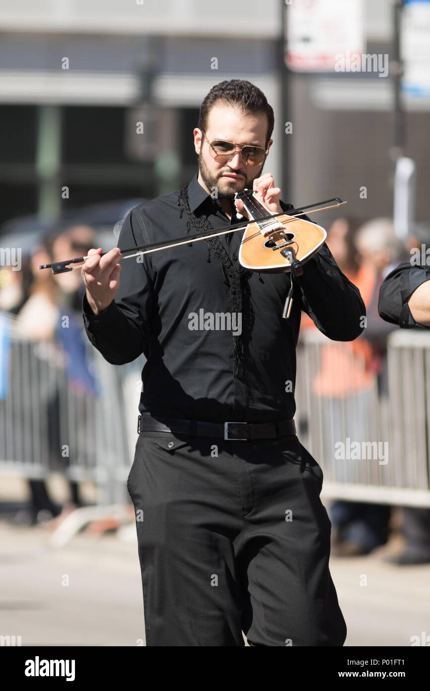 Chicago, Illinois, USA - April 29, 2018 Greek man playing the Lyra ...