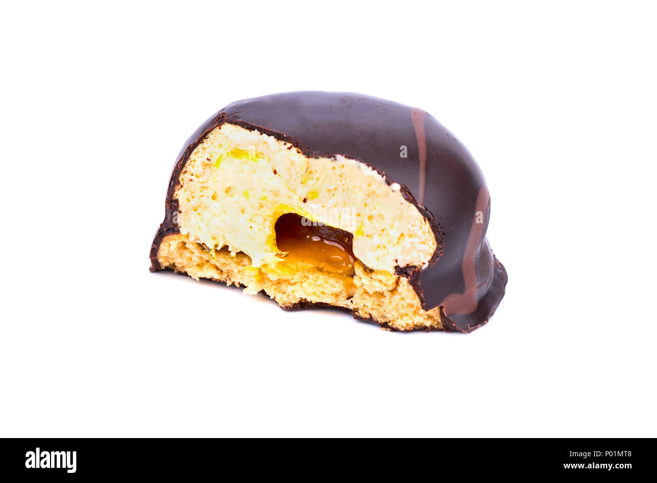 Bitten candy filled with marshmallows, cookies and jam on a white ...