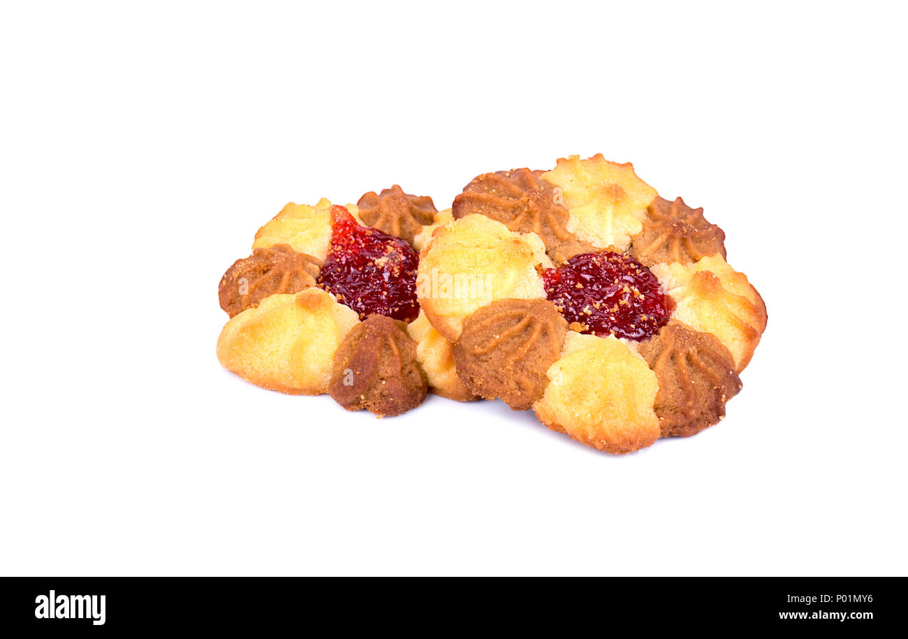 Two homemade cookies in the shape of a flower with red jam on a white ...