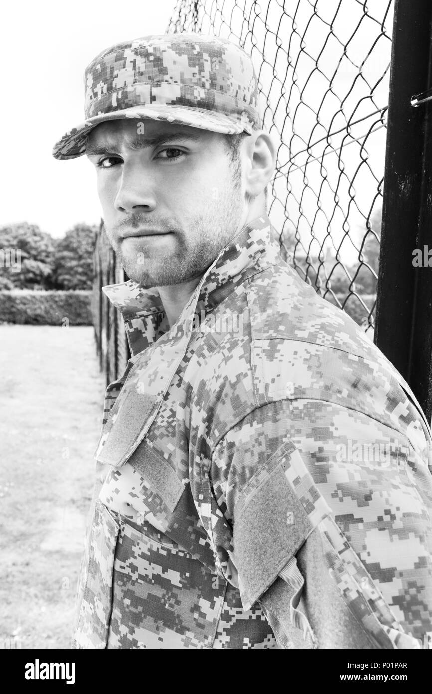 Soldiers in army fatigues Black and White Stock Photos & Images - Alamy