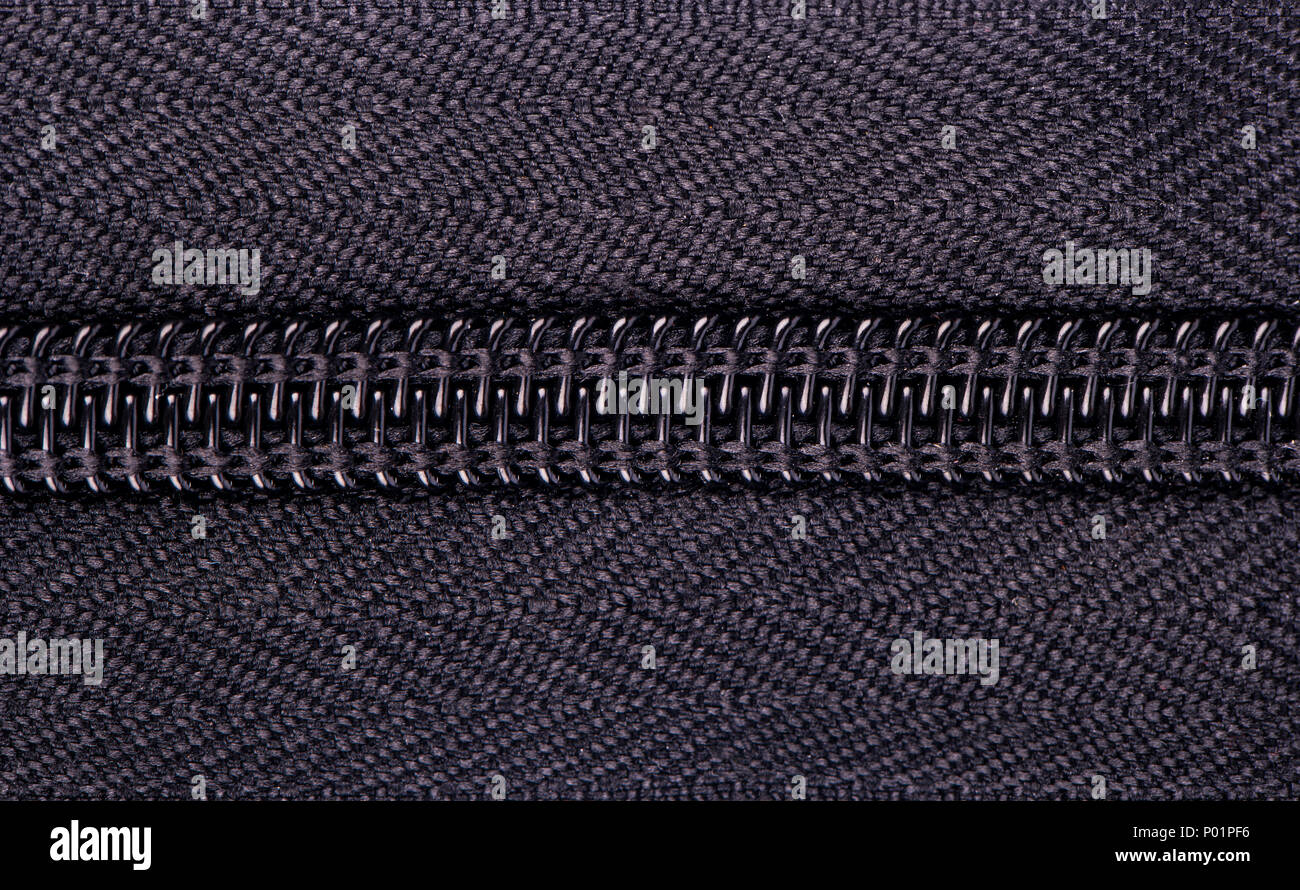 Background black closed zipper closeup Stock Photo - Alamy