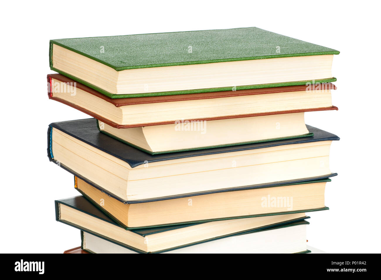 Heap of books and magnifying glass on white background Stock Photo - Alamy