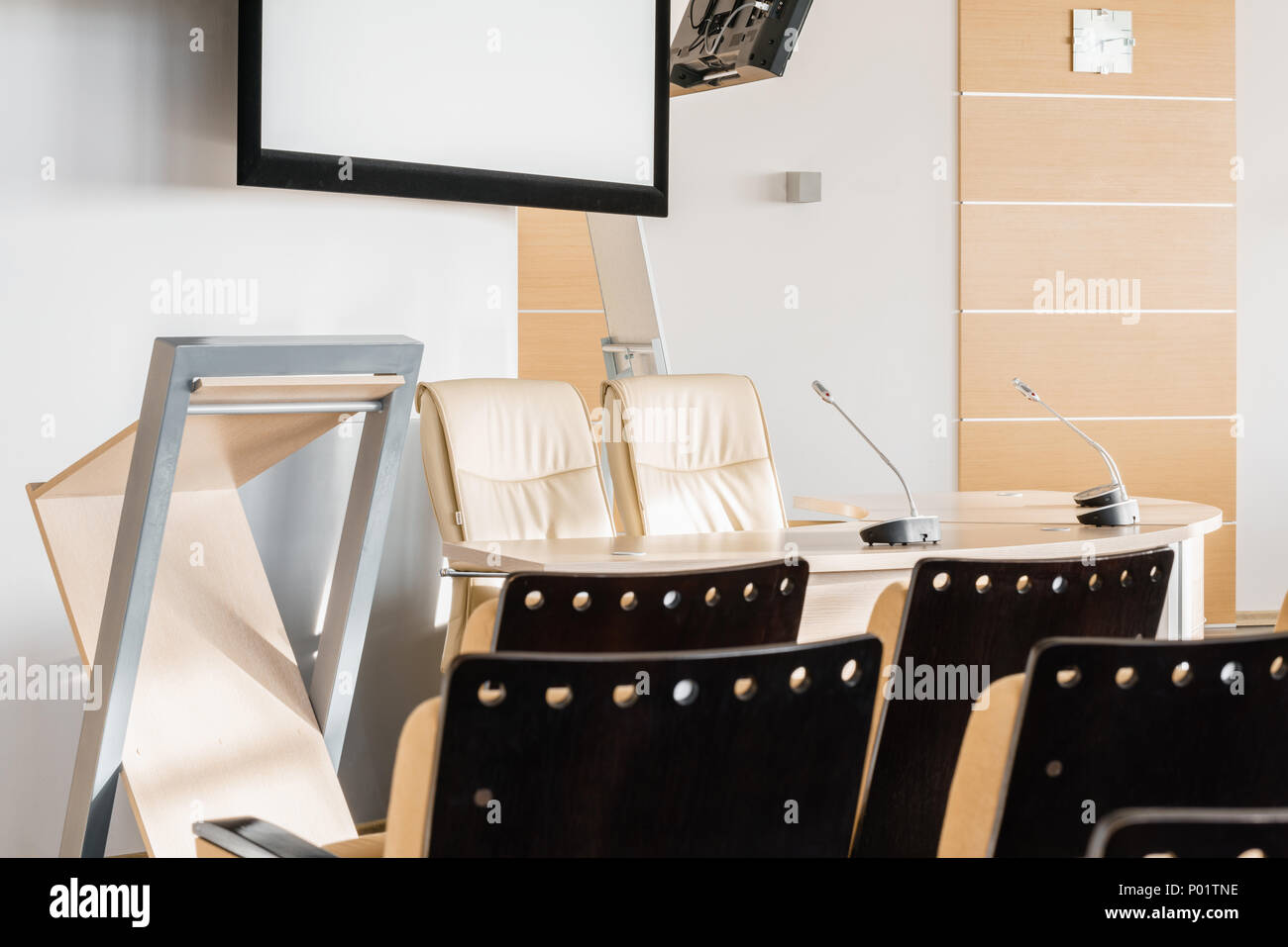 Seminar presentation. Empty conference room, lots of empty seats ...