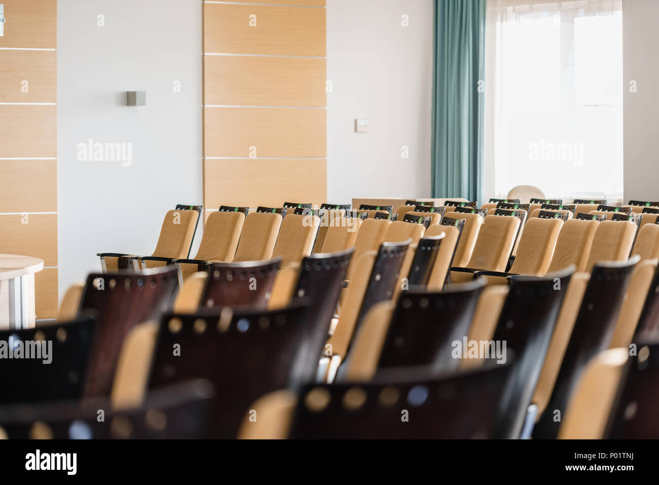 Seminar presentation. Empty conference room, lots of empty seats ...