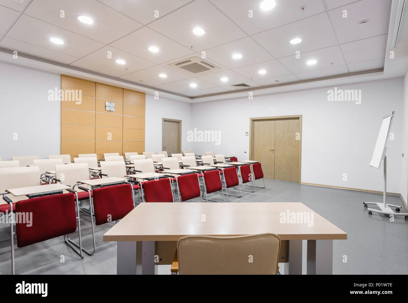 Seminar presentation. Empty conference room, lots of empty seats ...