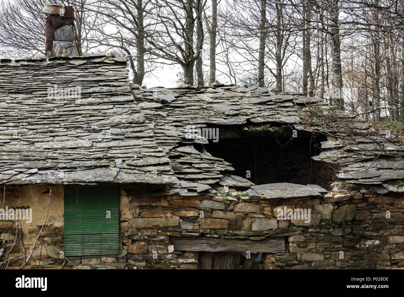 Ruined slate roof hole Stock Photo - Alamy