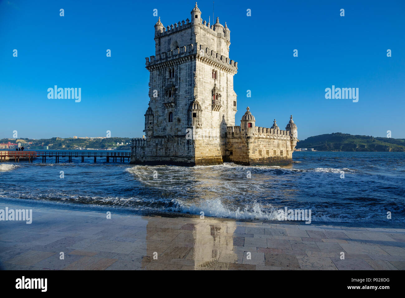 Belem tower and reflection, high tide Stock Photo - Alamy