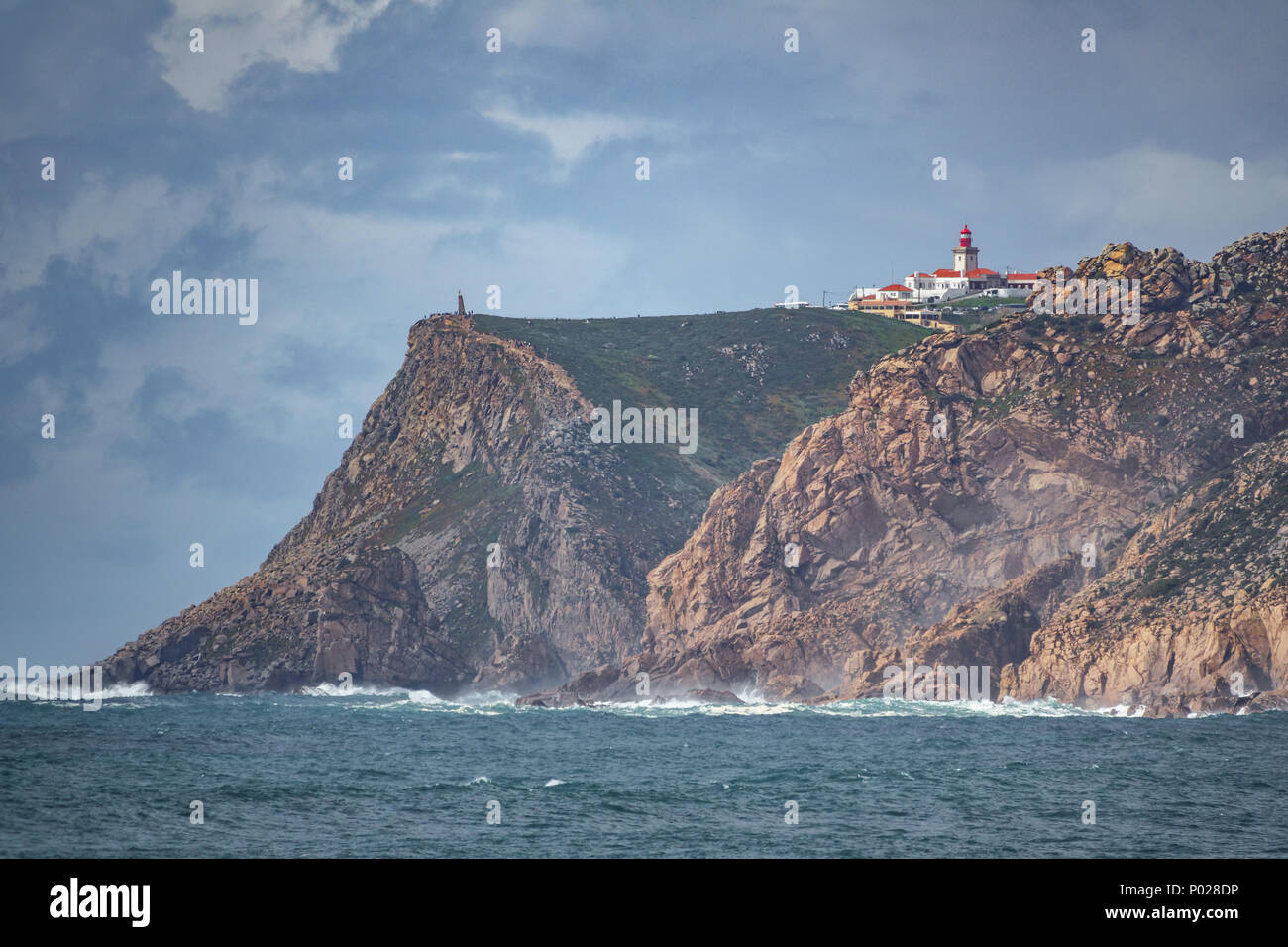 Cabo da Roca Lighthouse with small tourists Stock Photo - Alamy