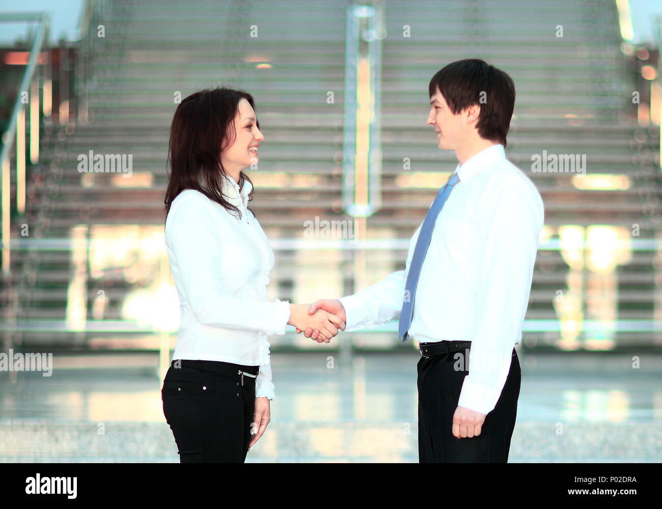 Friendly businessmen handshaking business hi-res stock photography and ...