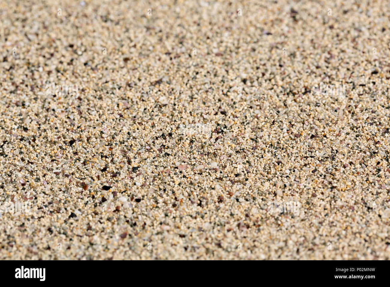 Sea sand, smooth background. Small pellets Stock Photo - Alamy