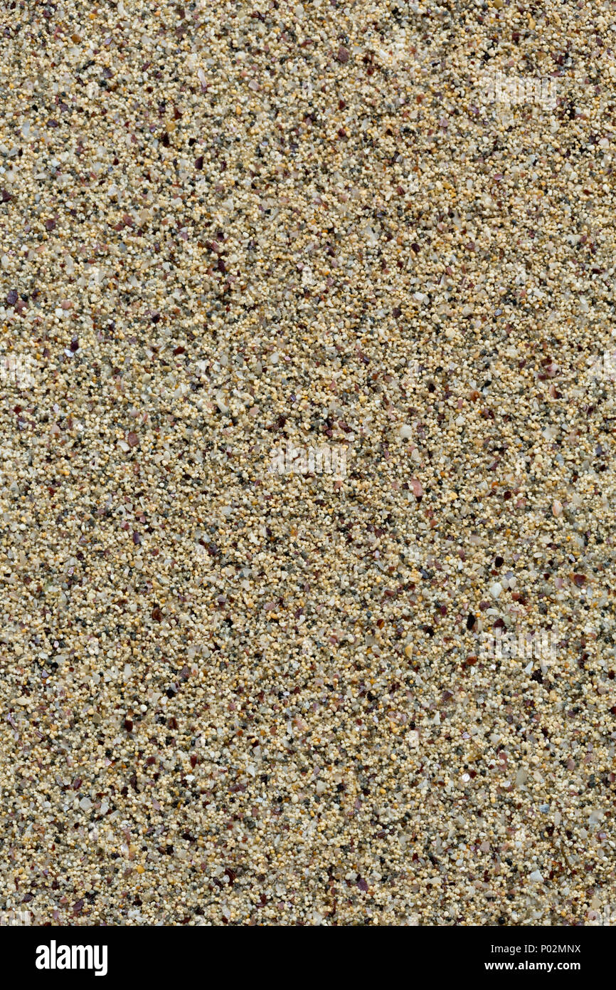 Sea sand, smooth background. Small pellets. Vertical Stock Photo - Alamy