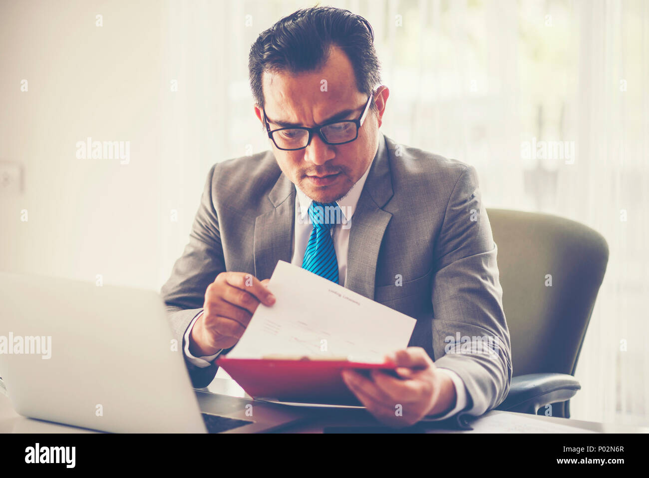 Banking business or financial analyst desktop accounting charts ...