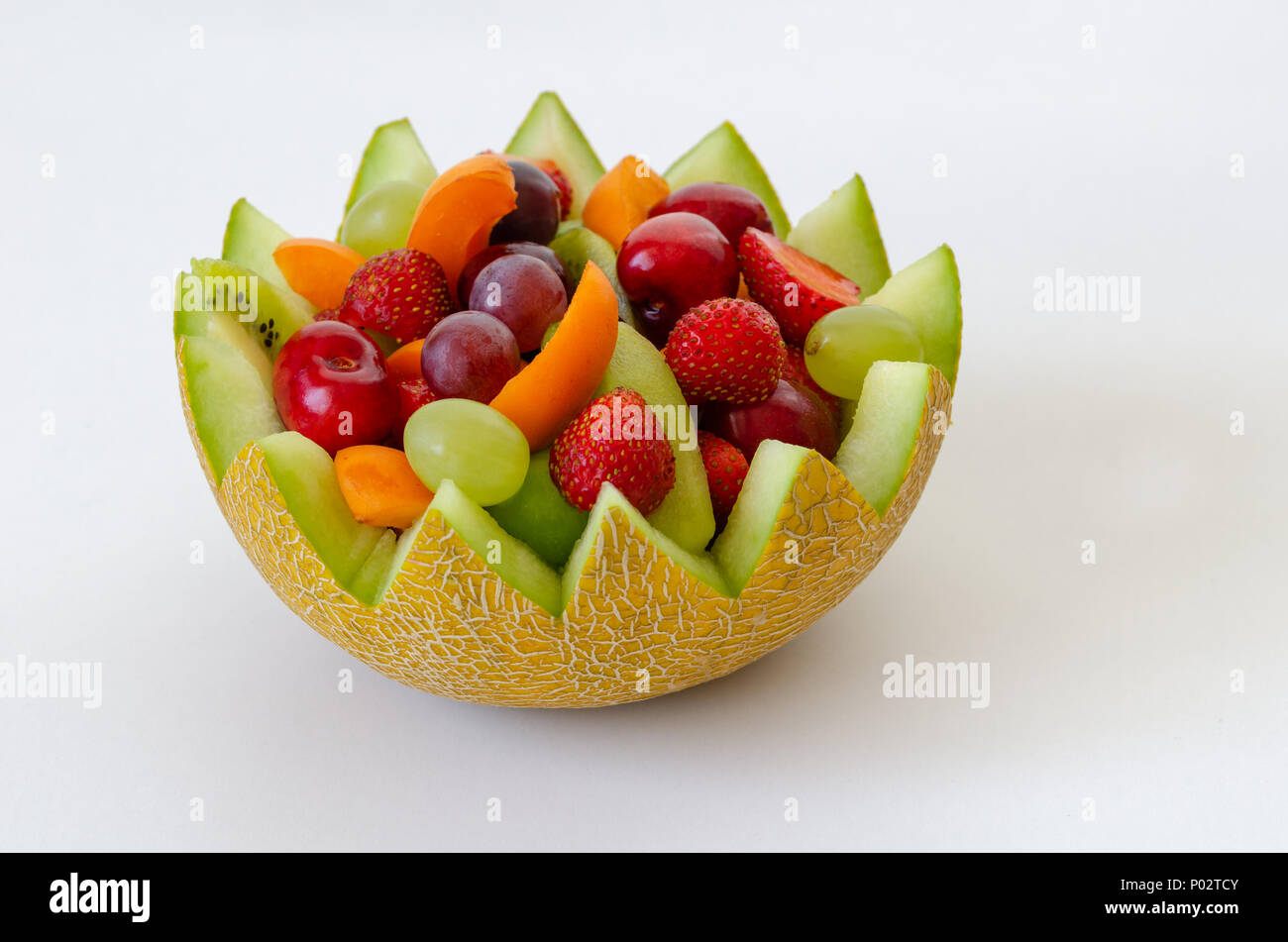 Fresh color fruits are in melon on white background.Isolated background ...