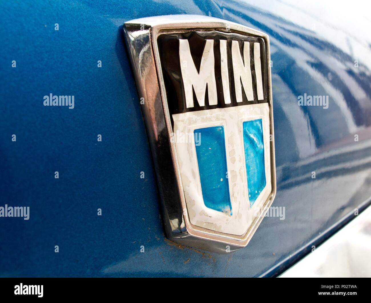 Mini cooper old logo in the hood of a car Mini cooper old logo in the ...