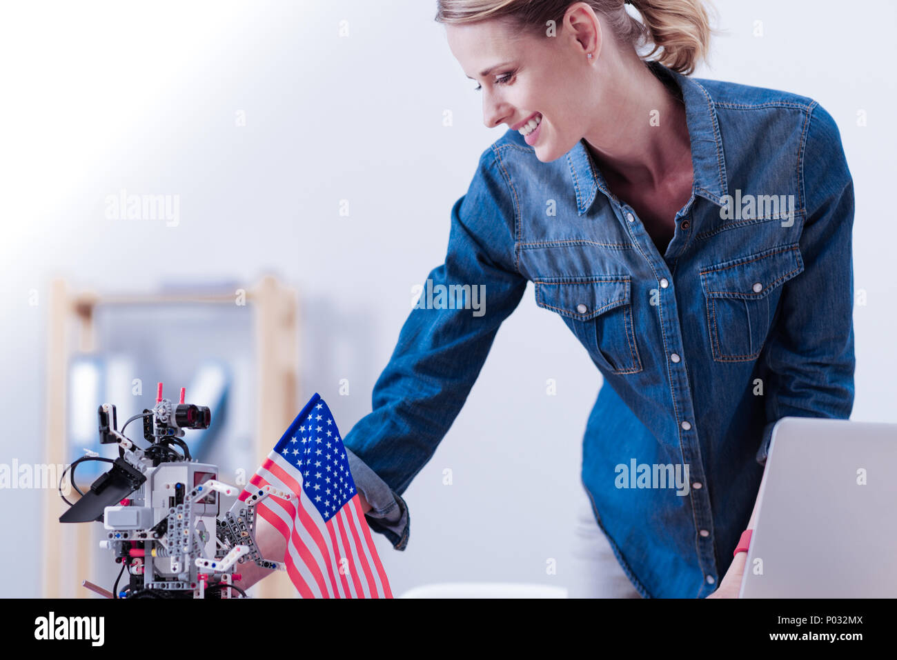 Delighted positive woman feeling happy Stock Photo - Alamy