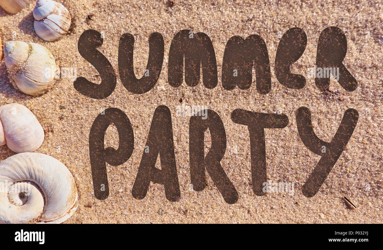 Summer party text drawn on a beach sea sand with seashells Stock Photo ...