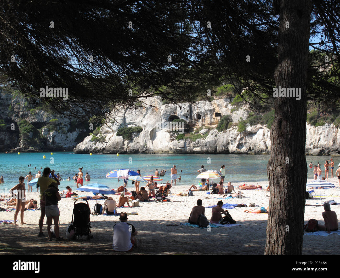 Minorca tourists in Cala Macarella beach Stock Photo - Alamy