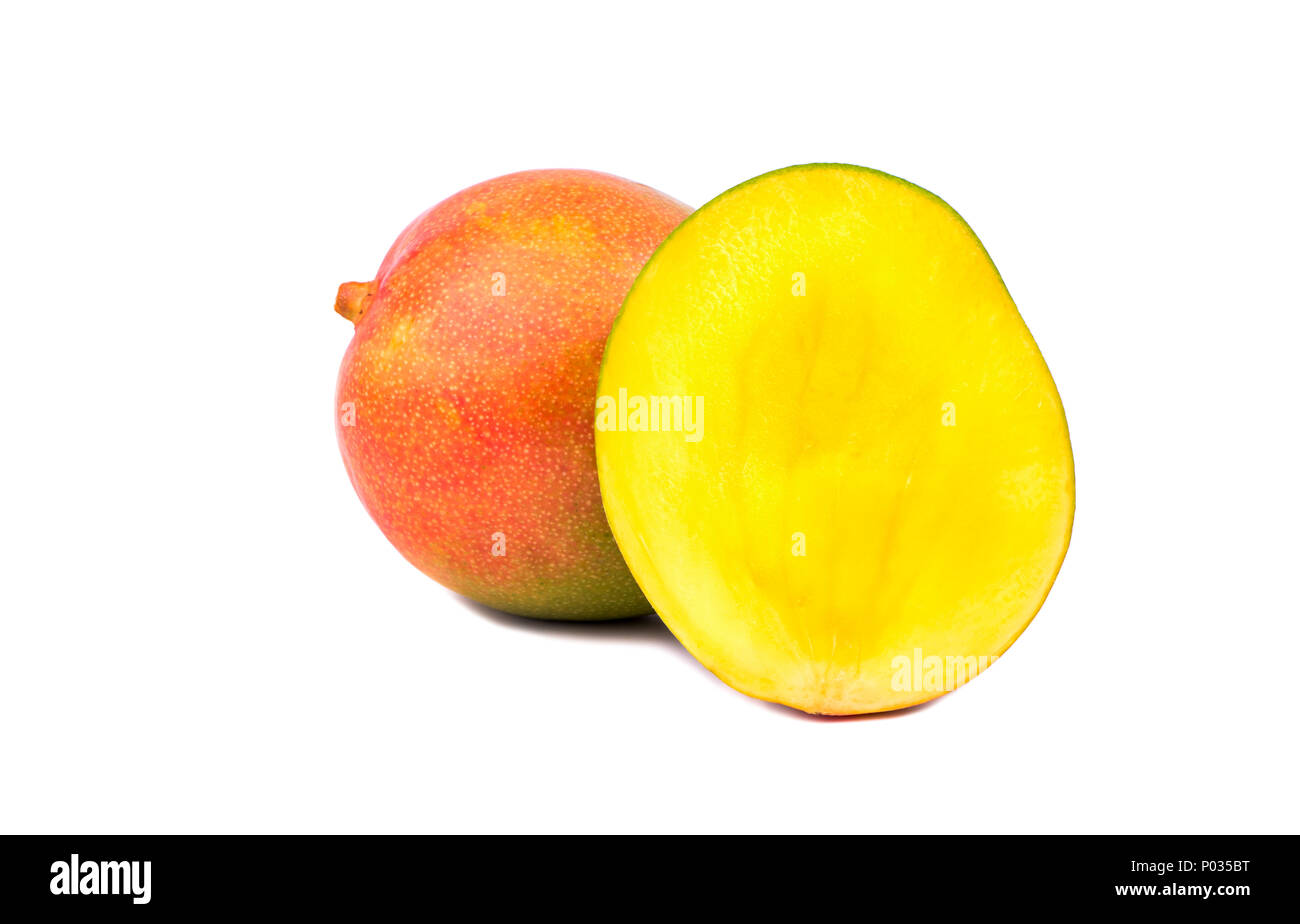 Fresh mango fruit with cut in half on a white background Stock Photo ...