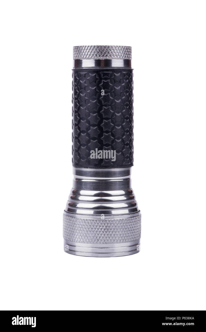 Handheld metal flashlight with rubber handle on a white background ...